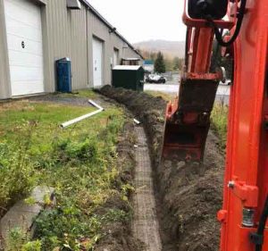 Excavation pour terrassement et pose de drain à Bromont